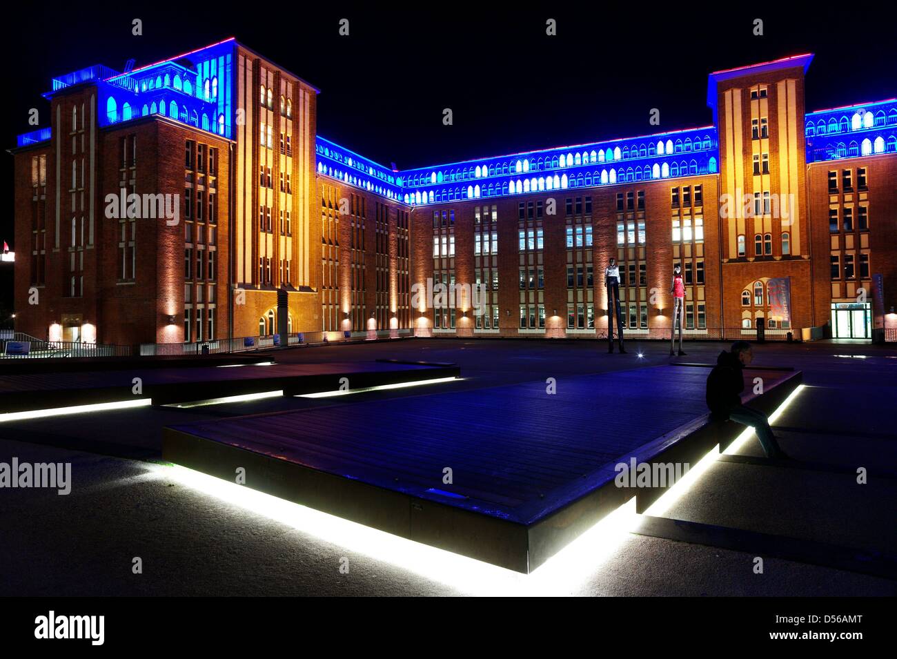 The central library is dipped in blue light in Hamburg, Germany, 10 ...
