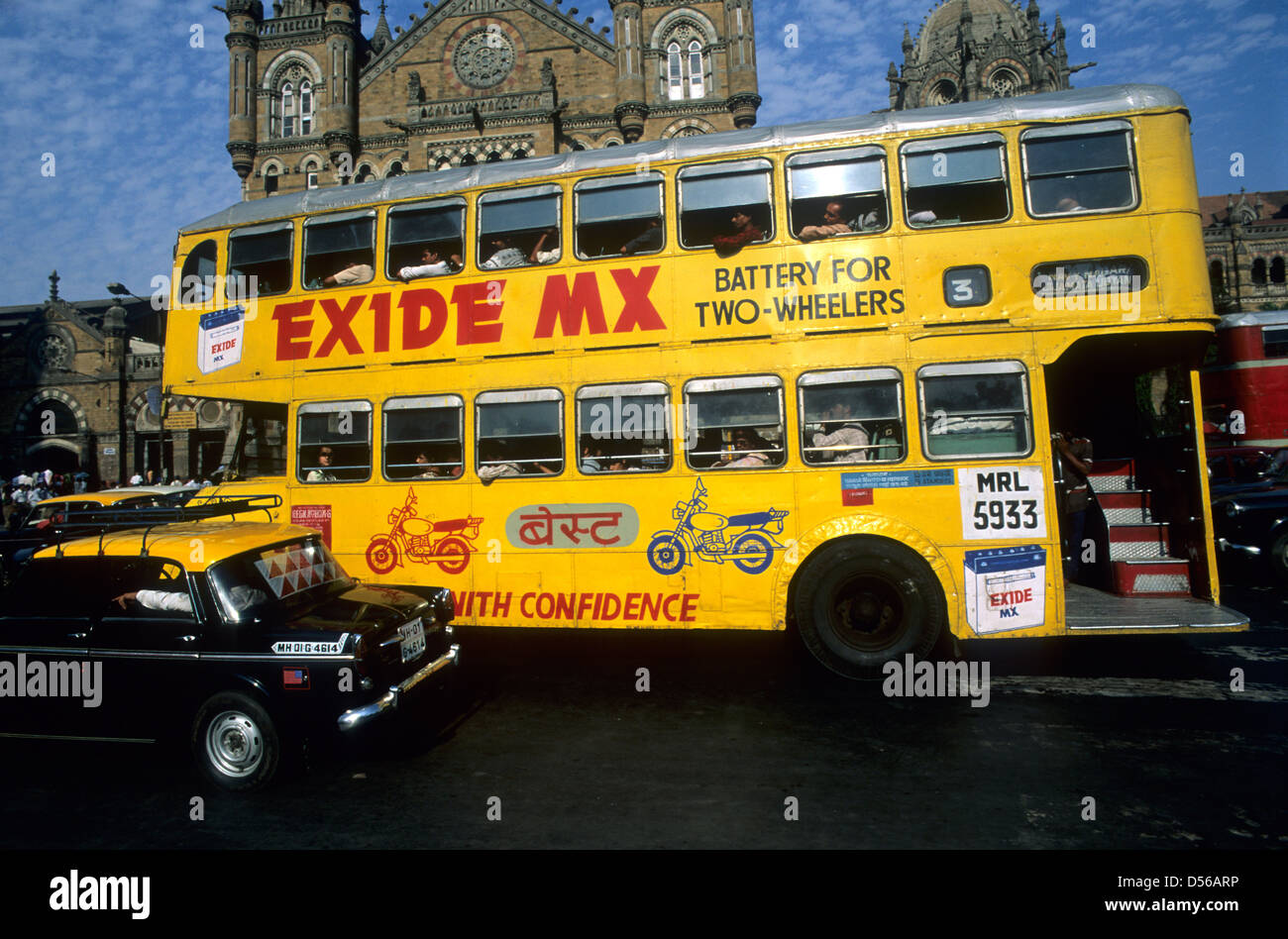 India, Bombay/Mumbai, public bus with advertisement outside Victoria ...