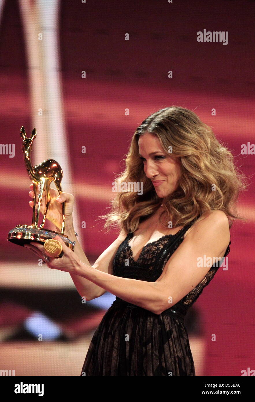 US actress and show host Sarah Jessica Parker holds the Bambi trophy ...