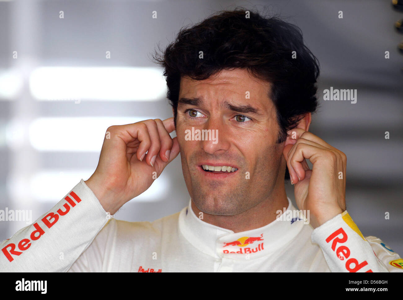 Australian driver Mark Webber of Red Bull Racing smiles during first ...