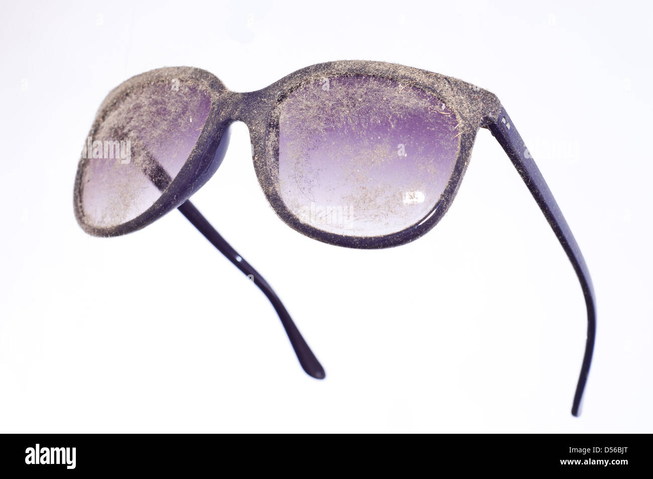 dusty lenses of blue glasses Stock Photo - Alamy