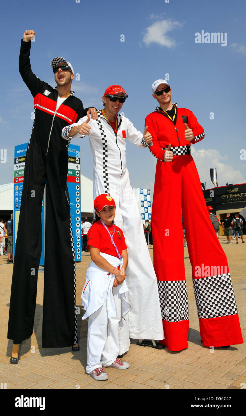 Artistes on stilts please the crowd before the title-decisive 2010 ...