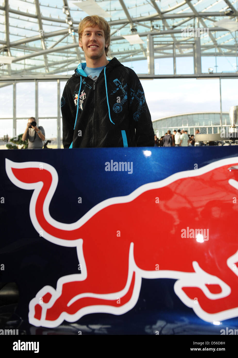 German Formula One World Whampion Sebstian Vettel of Red Bull stands ...