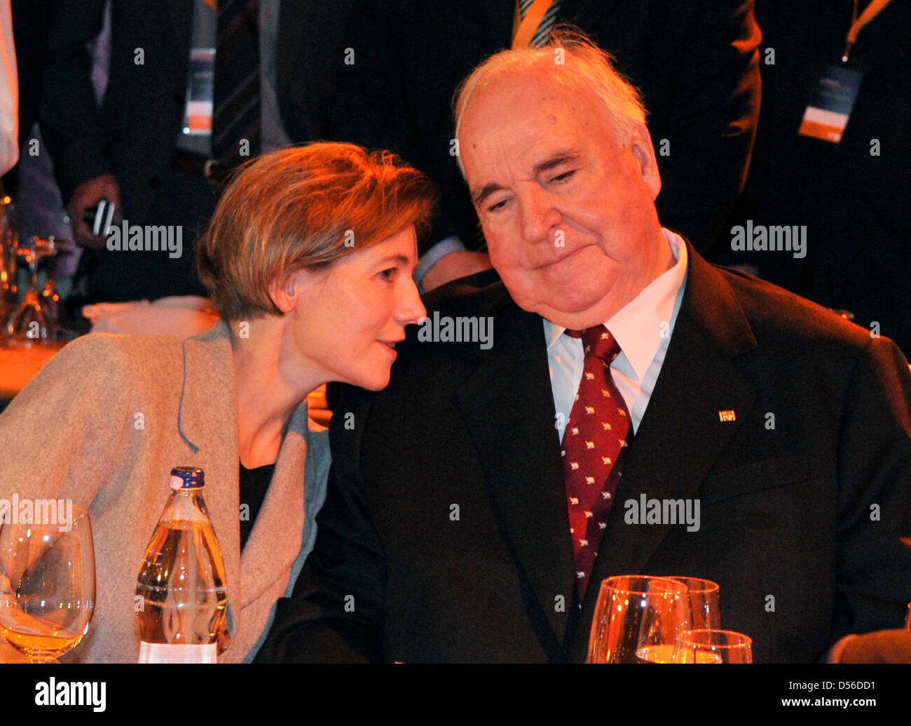 Former chancellor Helmut Kohl (R) and his wife Maike Kohl-Richter talk ...