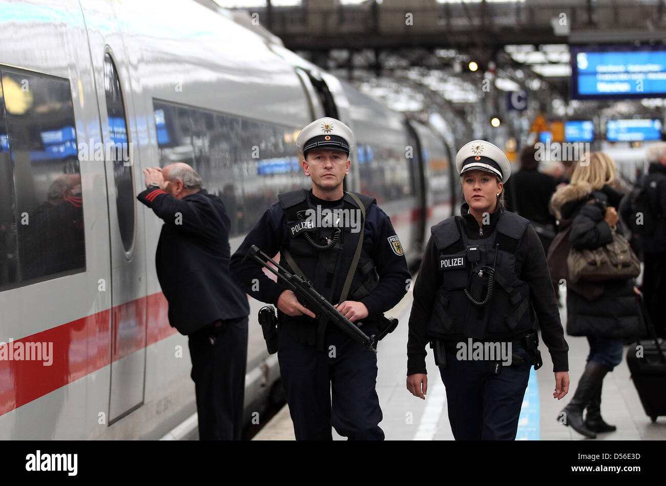 Police officers patrol at the central train station in Cologne, Germany ...