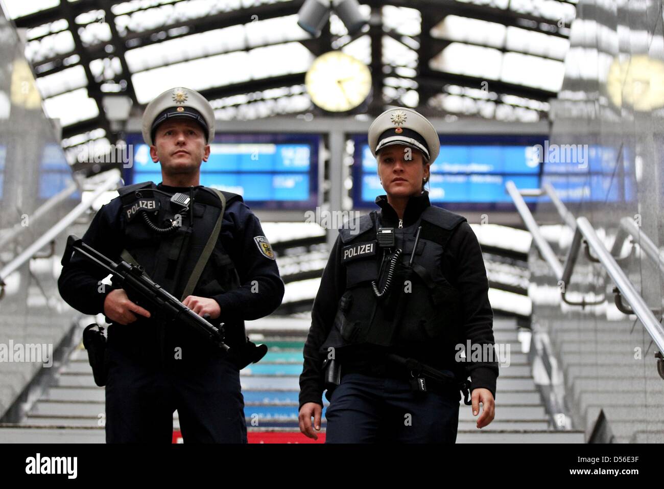 Police officers patrol at the central train station in Cologne, Germany ...