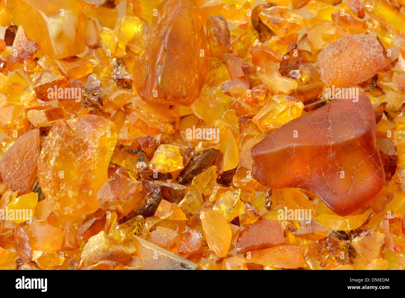 A bunch of different sized pieces of amber Stock Photo - Alamy