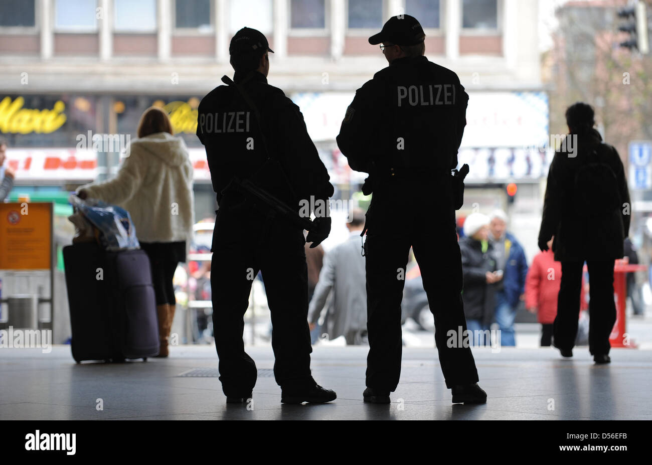 Police officers are on patrol in front of central station in Munich ...