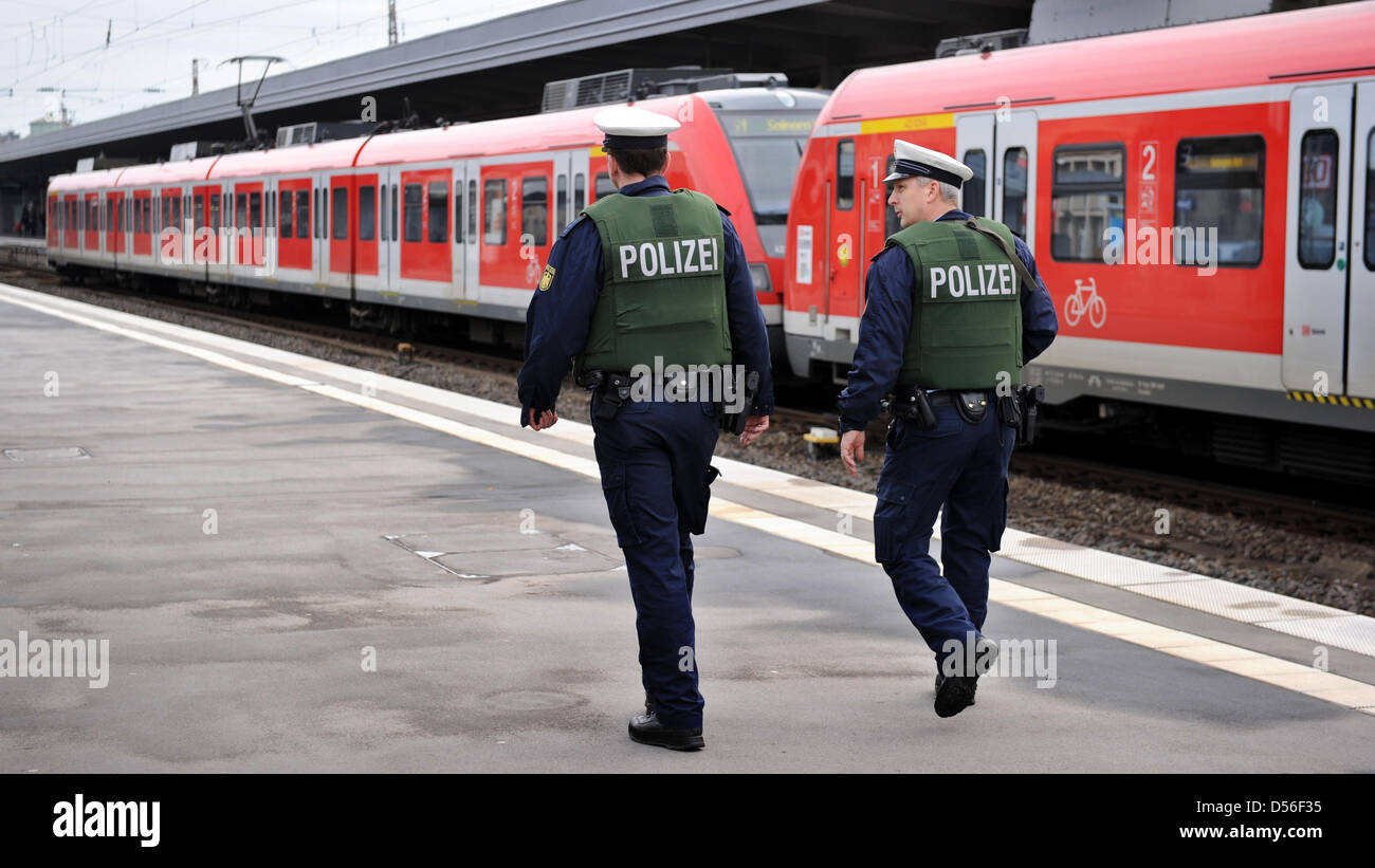 Police officers monitor the central station of Essen, Germany, 19 ...