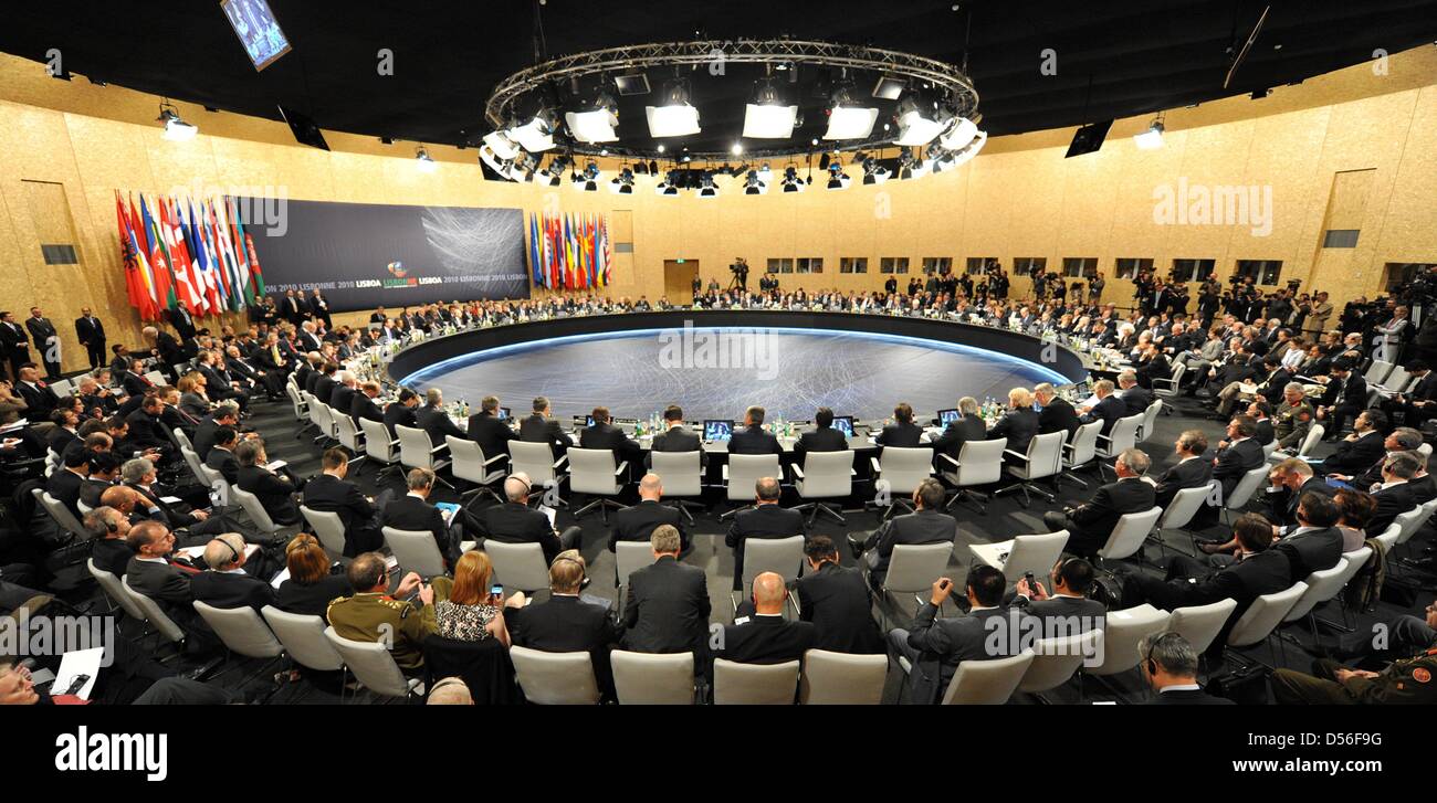 International politicians sit in the conference hall during another ...