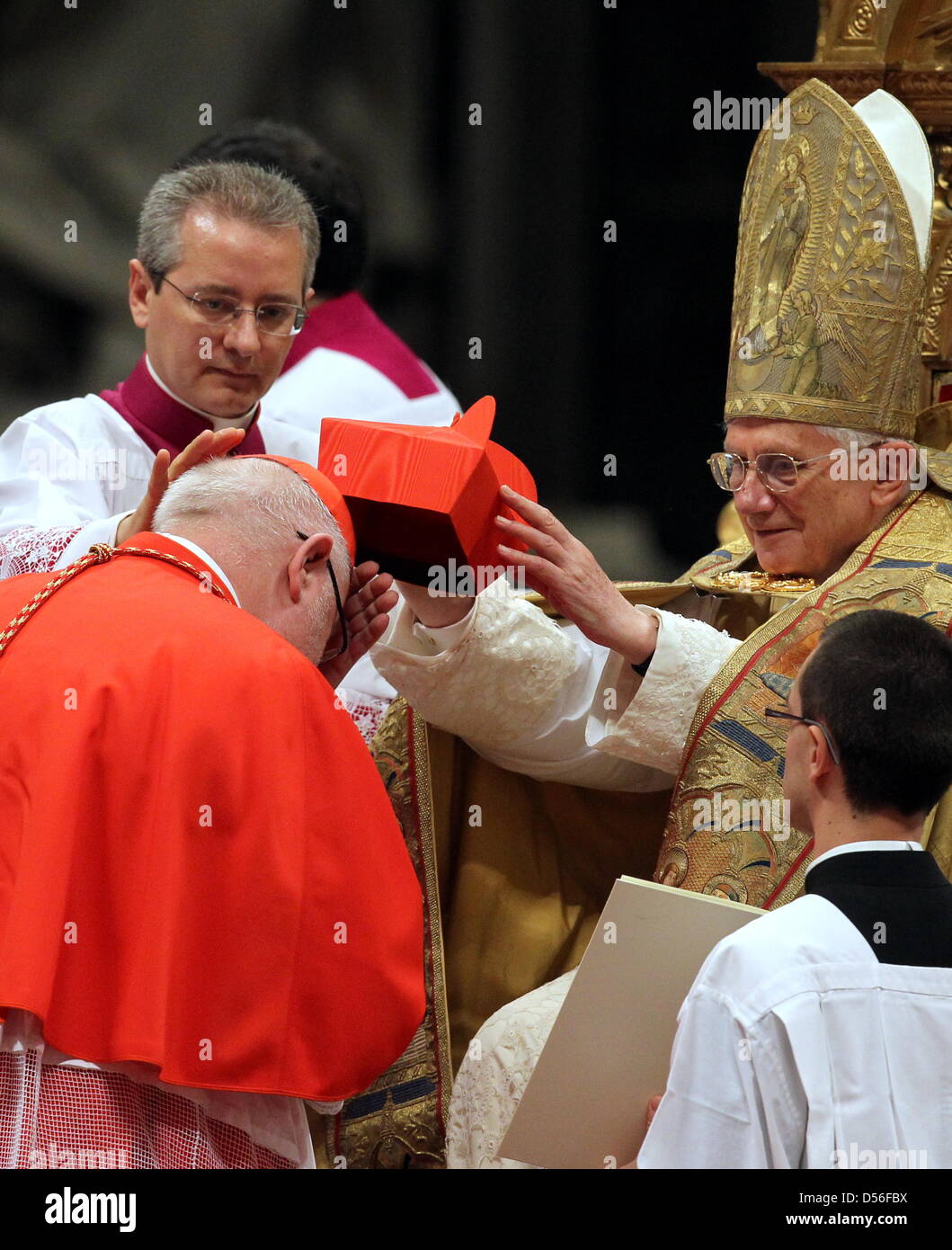 Arch bishop of Munich and Freising, Reinhard Marx (L) receives the ...