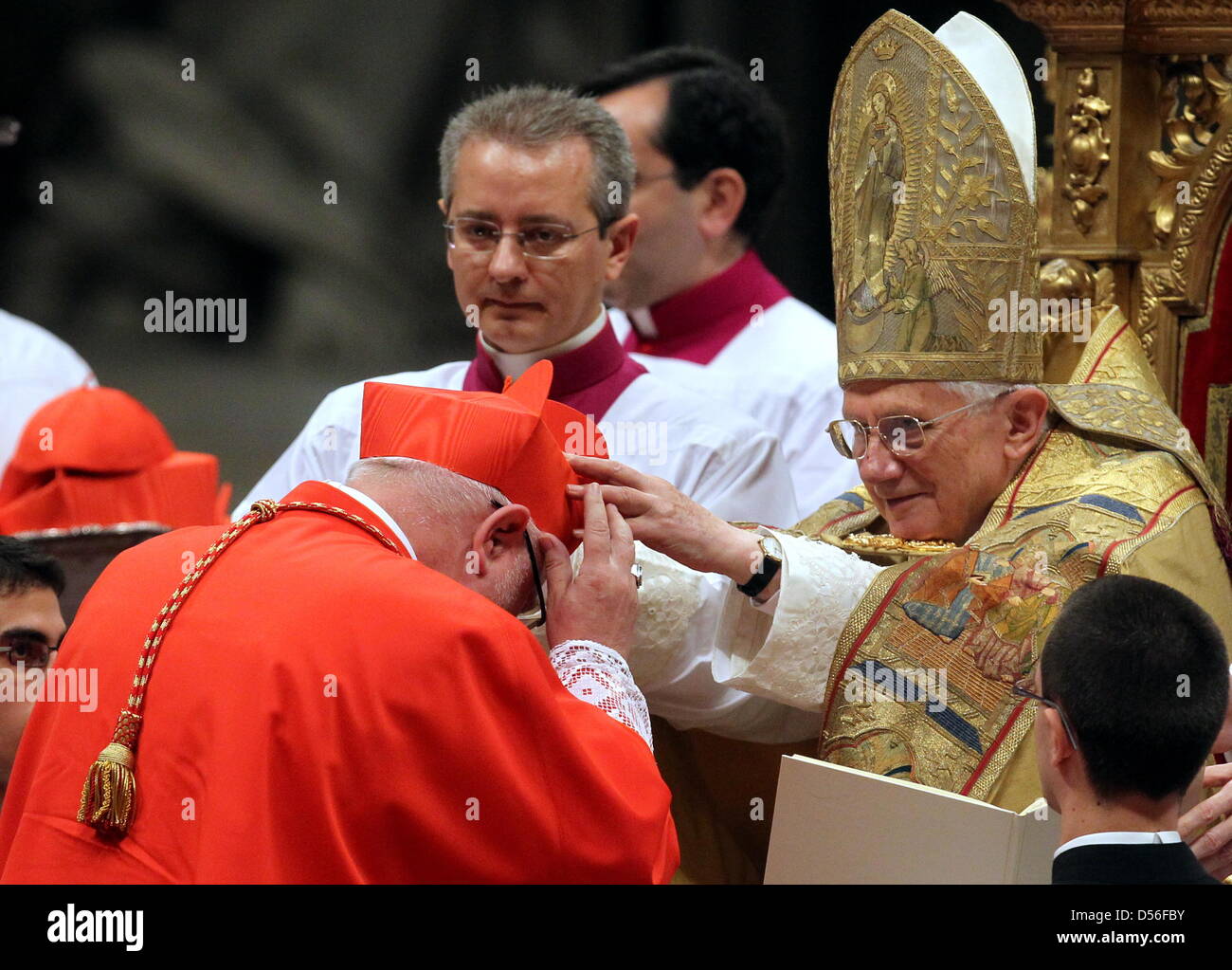 Arch bishop of Munich and Freising, Reinhard Marx (L) receives the ...