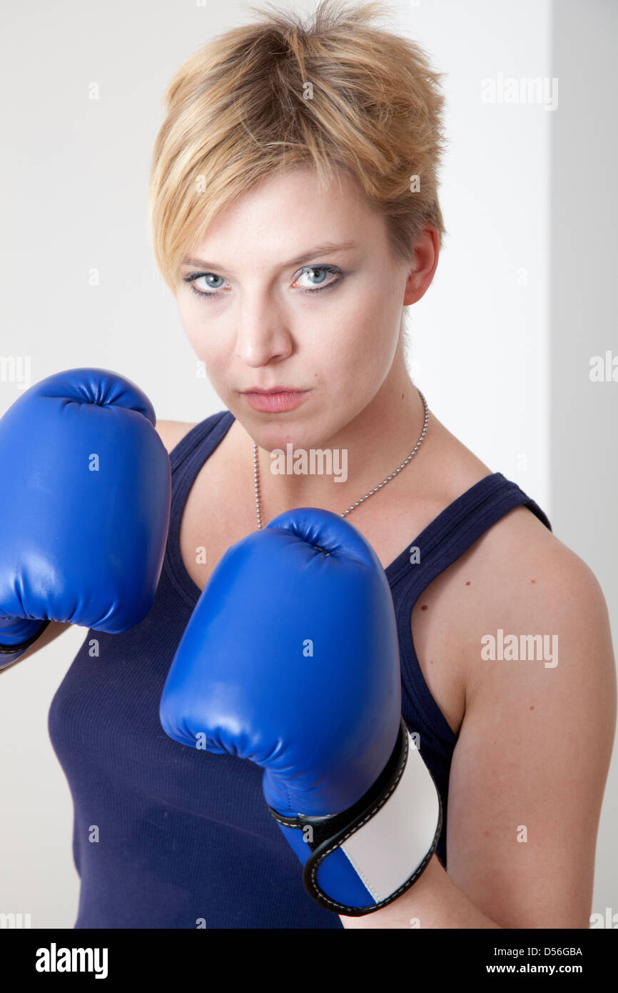 Caucasian boxer with raised fists Stock Photo - Alamy