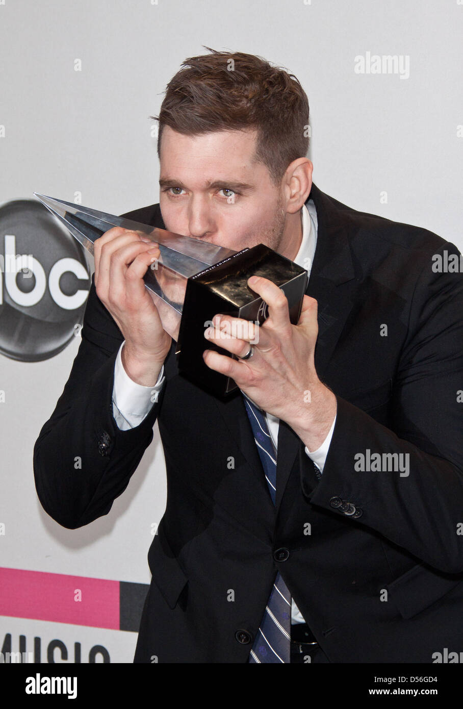 Canadian singer Michael Buble kisses his award for Favorite Adult ...