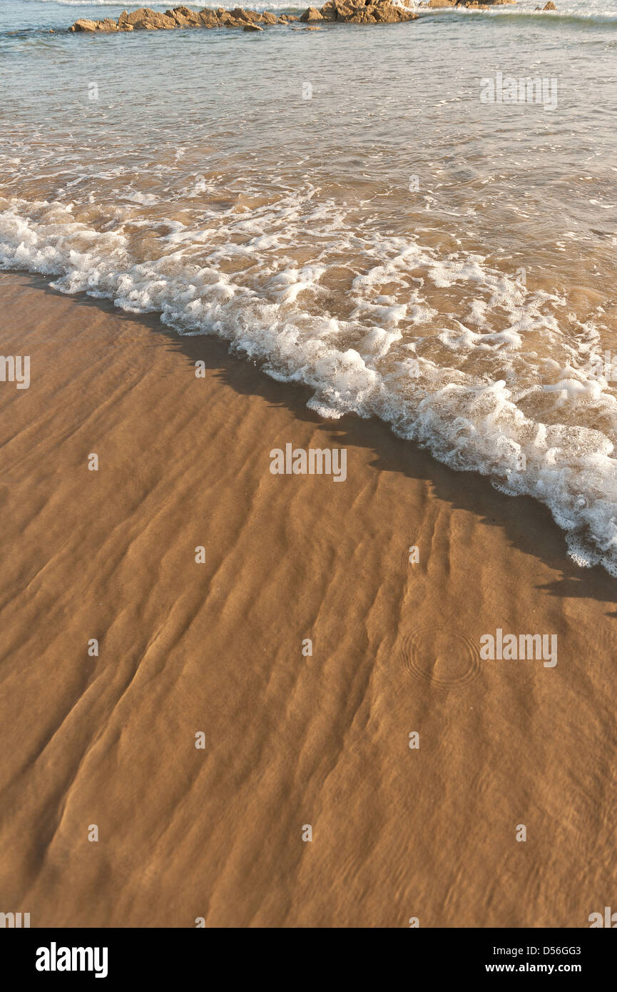 Low tide ripples reflections refraction stream wave patterns in shallow ...