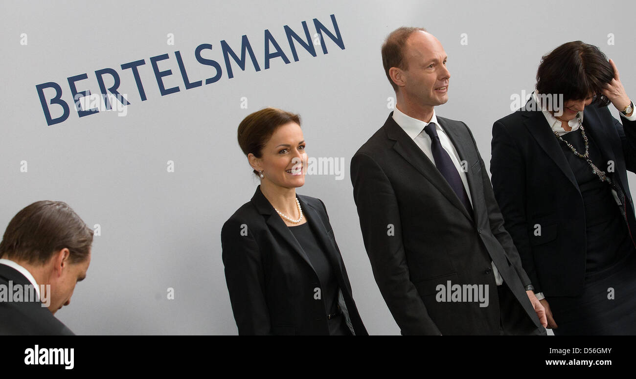 CFO of Bertelsmann, Judith Hartmann (2-L), CEO of Bertelsmann, Thomas ...