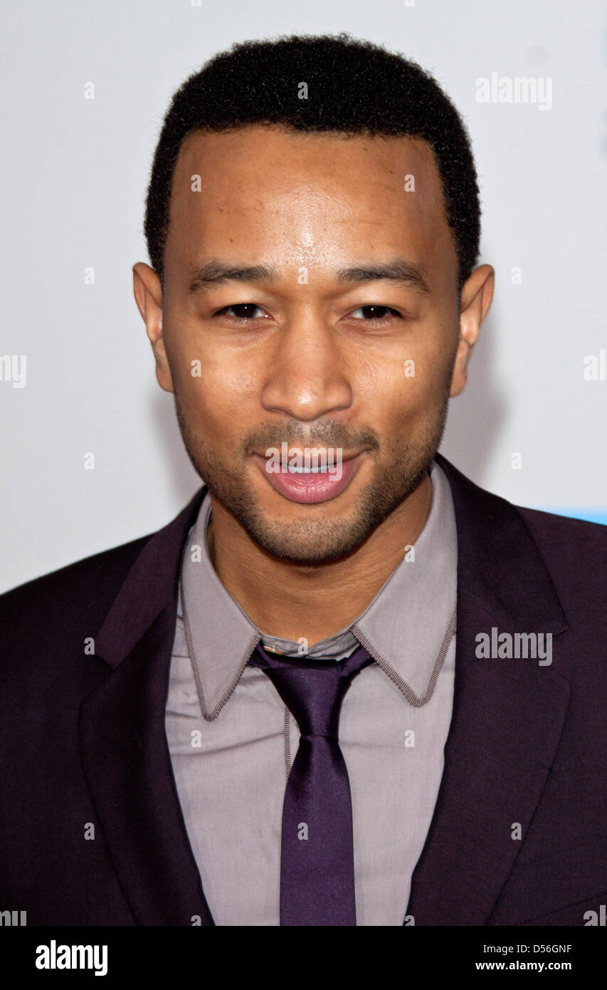 US singer John Legend arrives for the 38th Annual American Music Awards ...