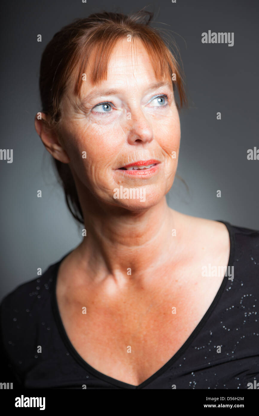 Middle aged woman in studio hi-res stock photography and images - Alamy