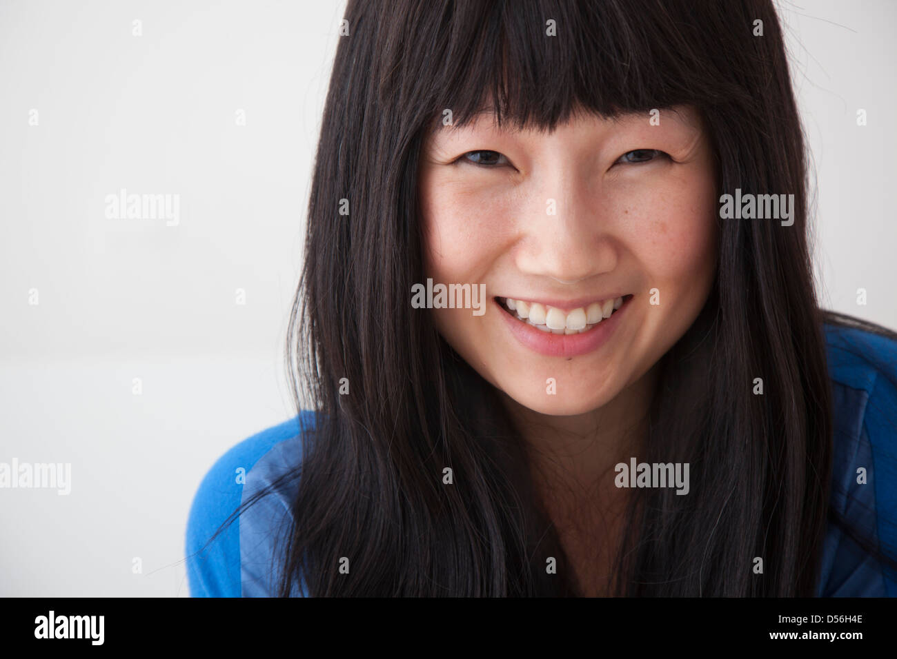 Chinese woman smiling Stock Photo - Alamy