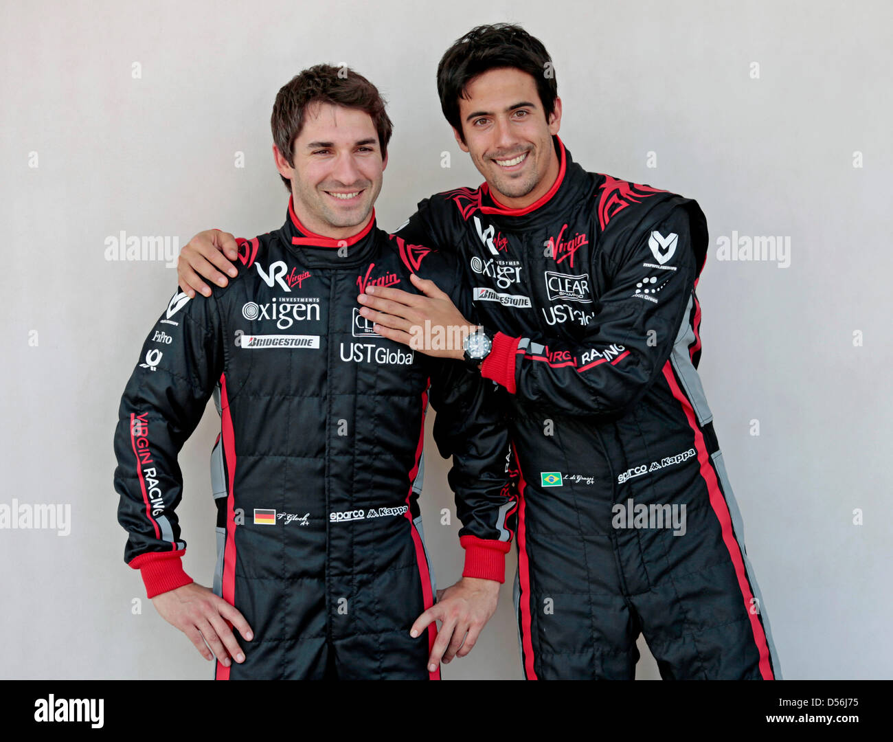Virgin Racing's German Formula One driver Timo glock (L) and his ...