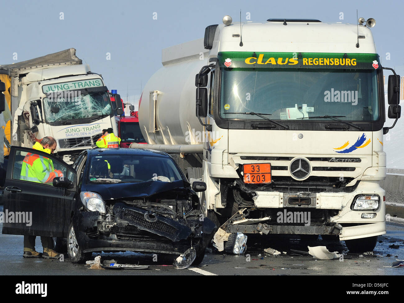 Firemen secure the site of a multiple pile-up on German motorway A8 ...