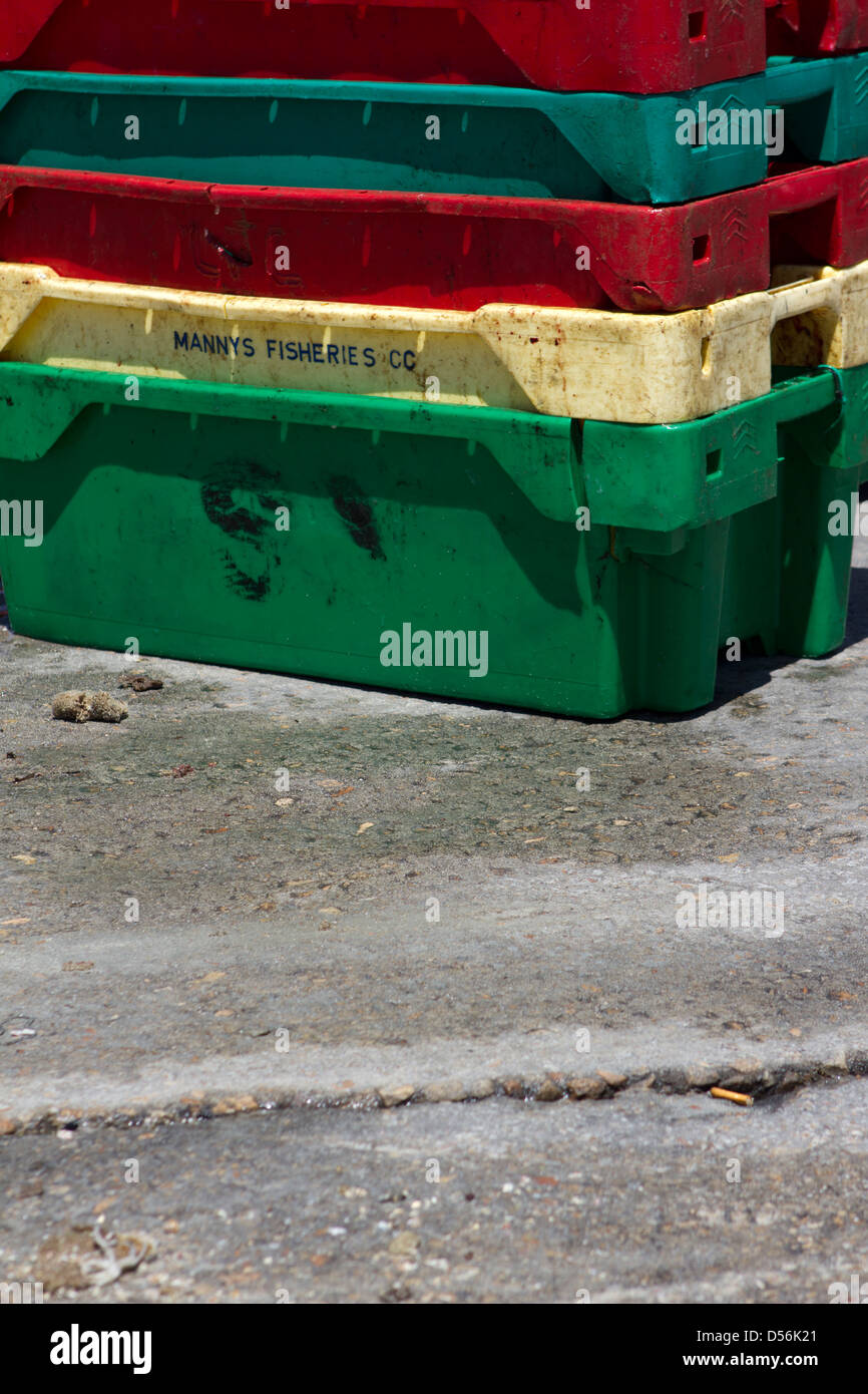 Empty crates stacked in Struisbaai Harbour, South Africa Stock Photo ...