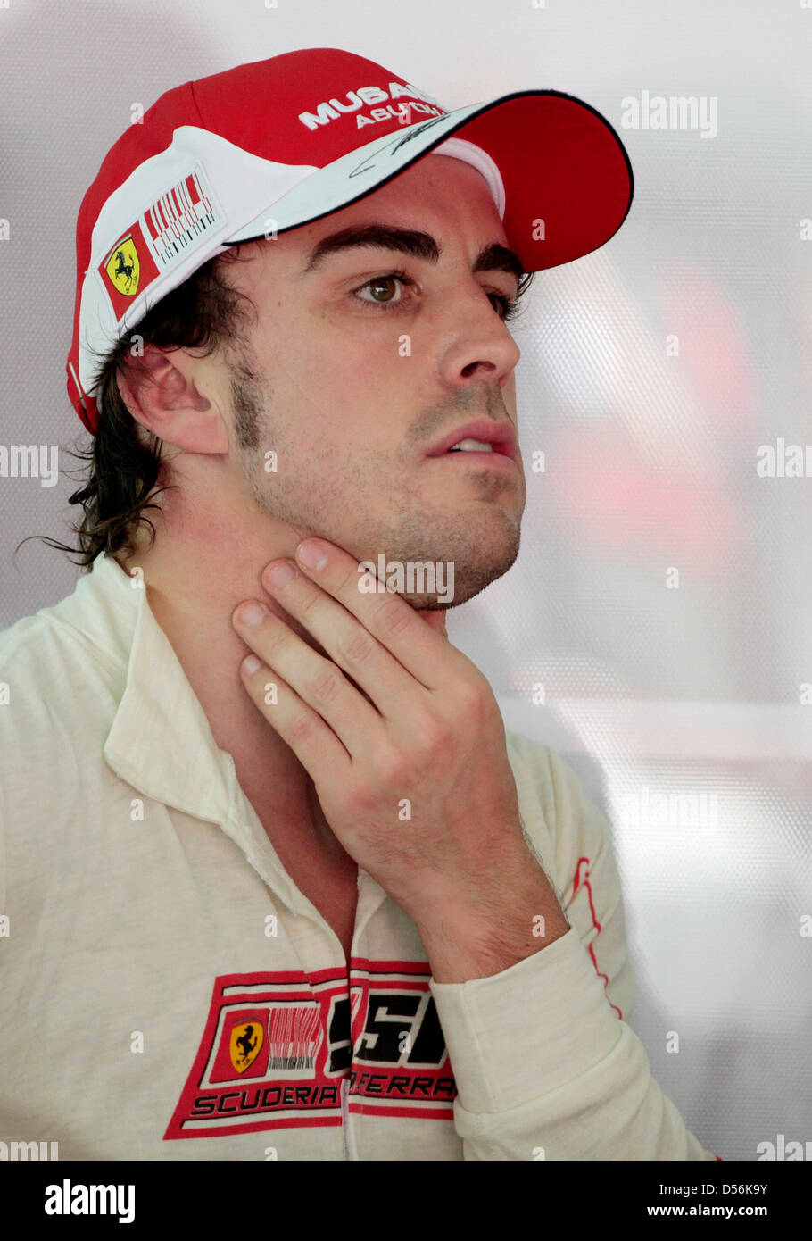 Spain's Formula One driver Fernando Alonso of team Ferrari stands at ...