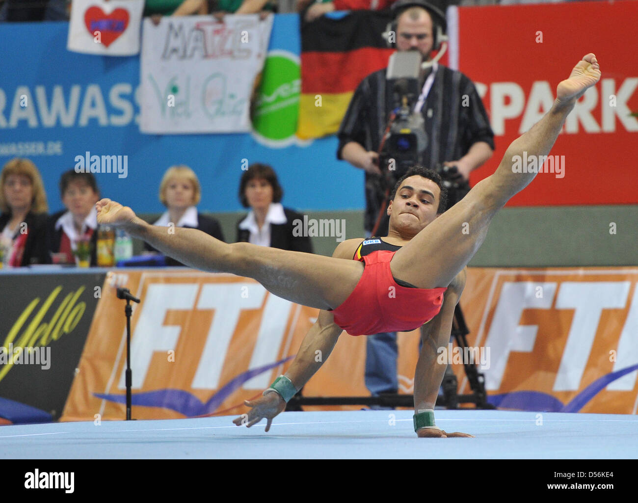 Germany's gymnast Matthias Fahrig shows his excersise on the ground ...