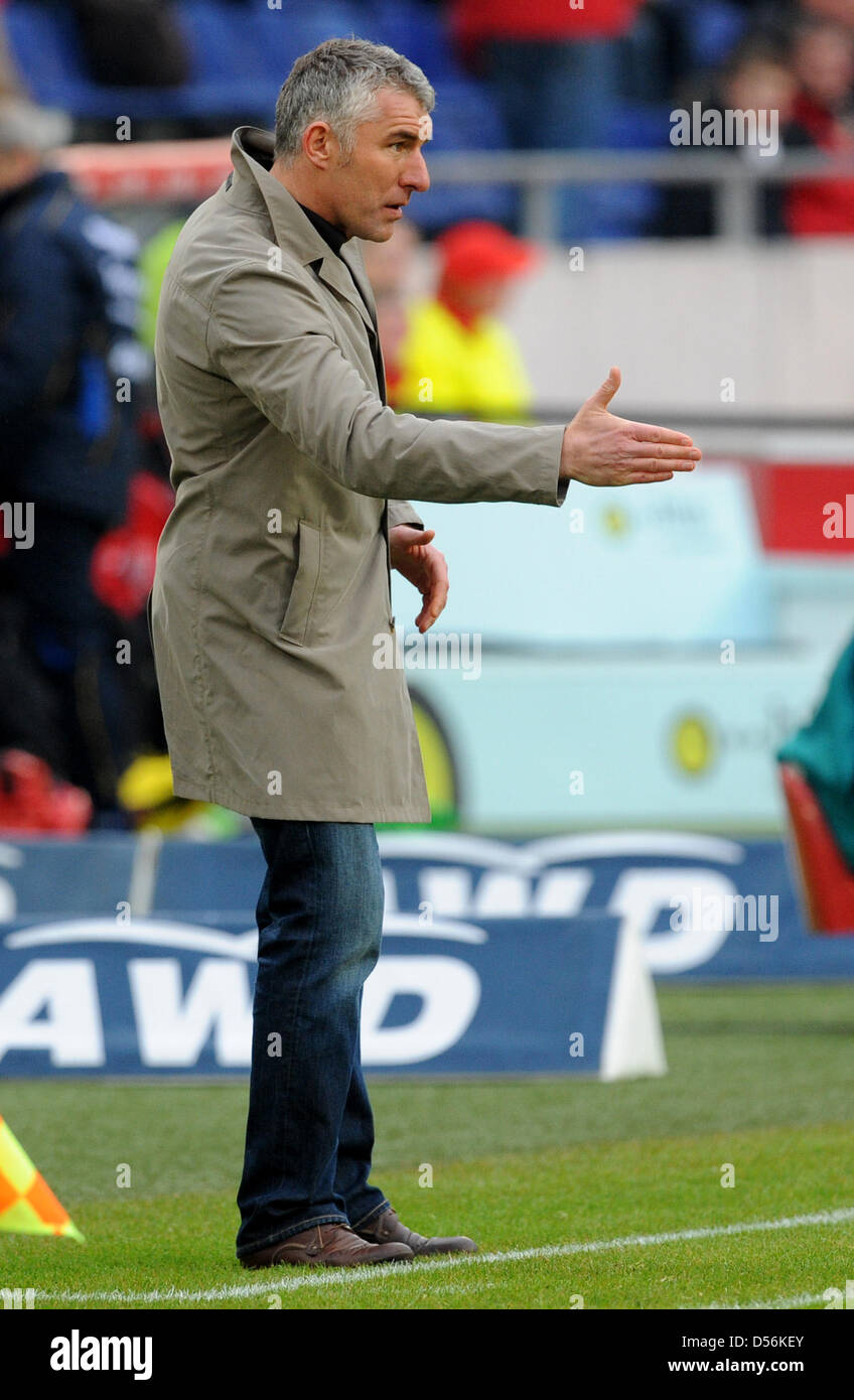Hanover's coach Mirko Slomka watches during German Bundesliga match ...