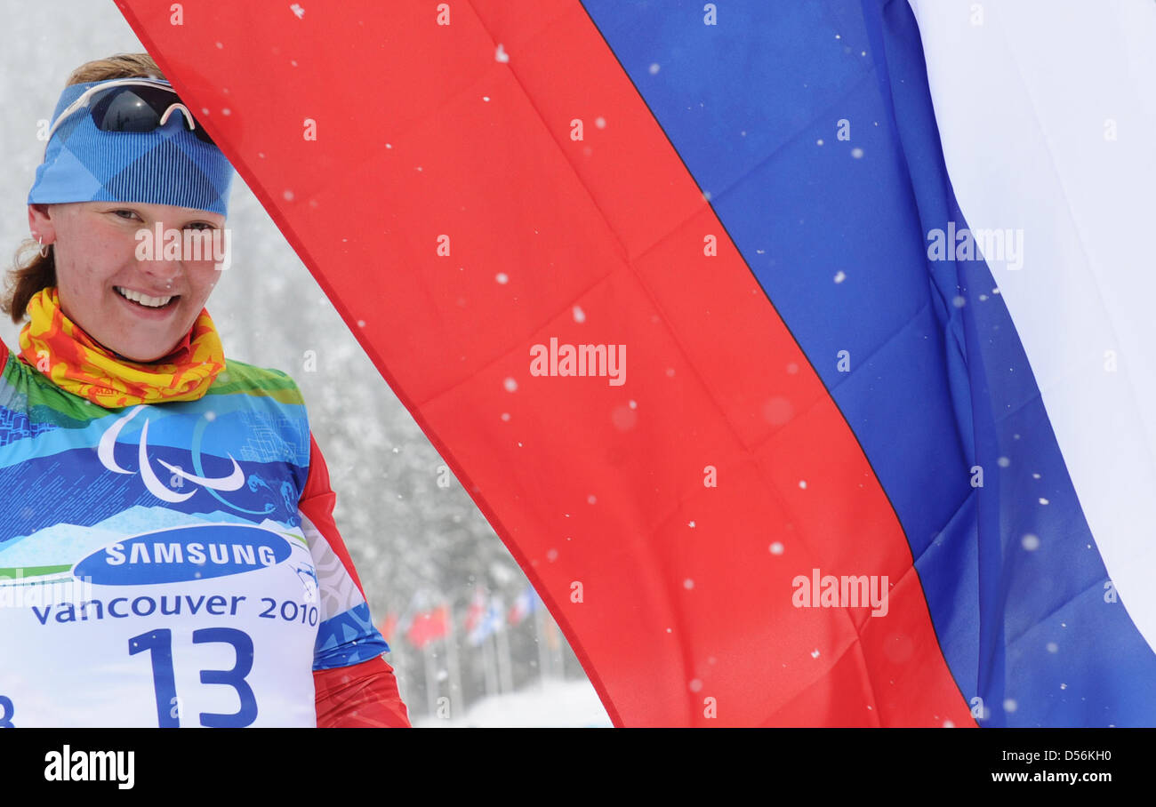 Russian biathlete Anna Burmistrova celebrates her victory in the 3km ...