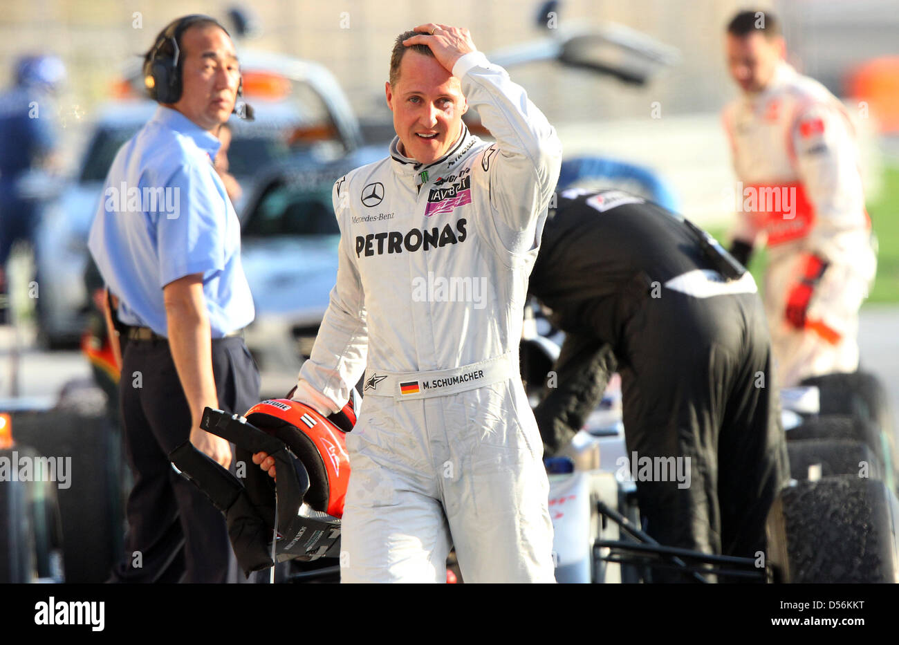 German Michael Schumacher (C) of Mercedes Grand Prix seen after the ...