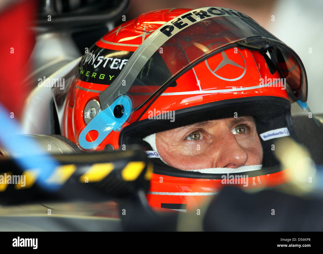 Seven-times Formula One world champion Michael Schumacher sits in his ...