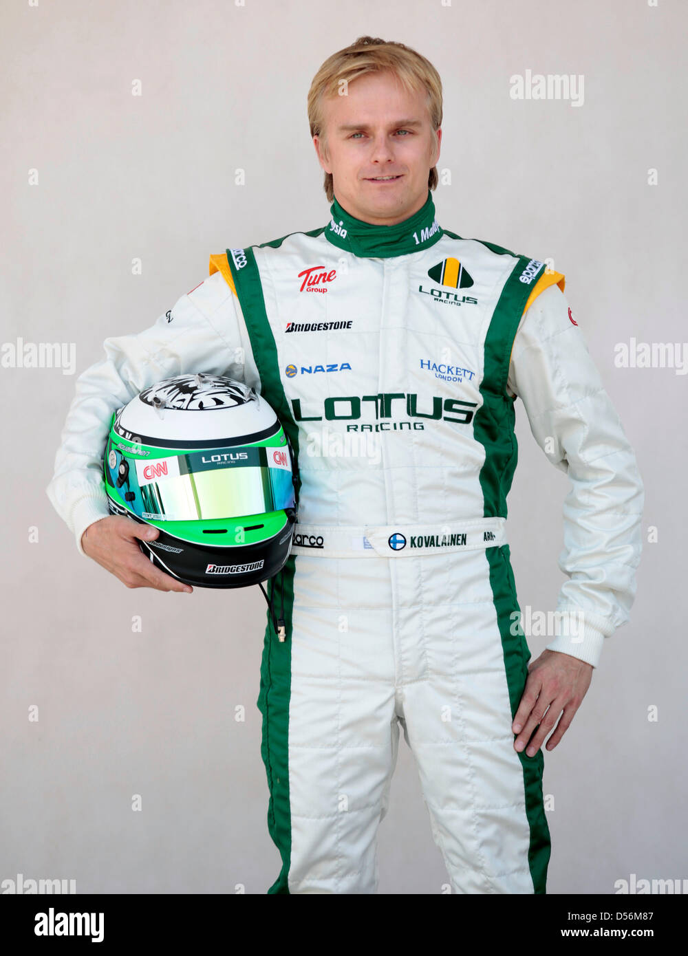 Finnish driver Heikki Kovalainen of Lotus Racing poses for ...