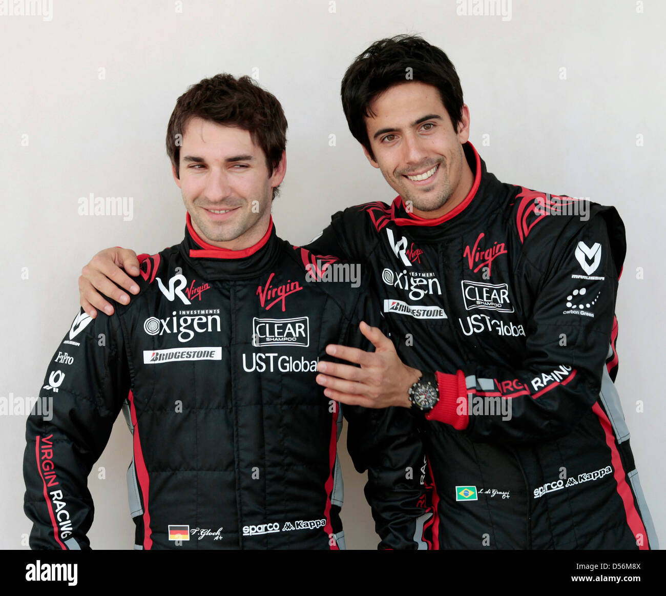 German Timo Glock and Brazilian teammate Lucas di Grassi (R) of Virgin ...