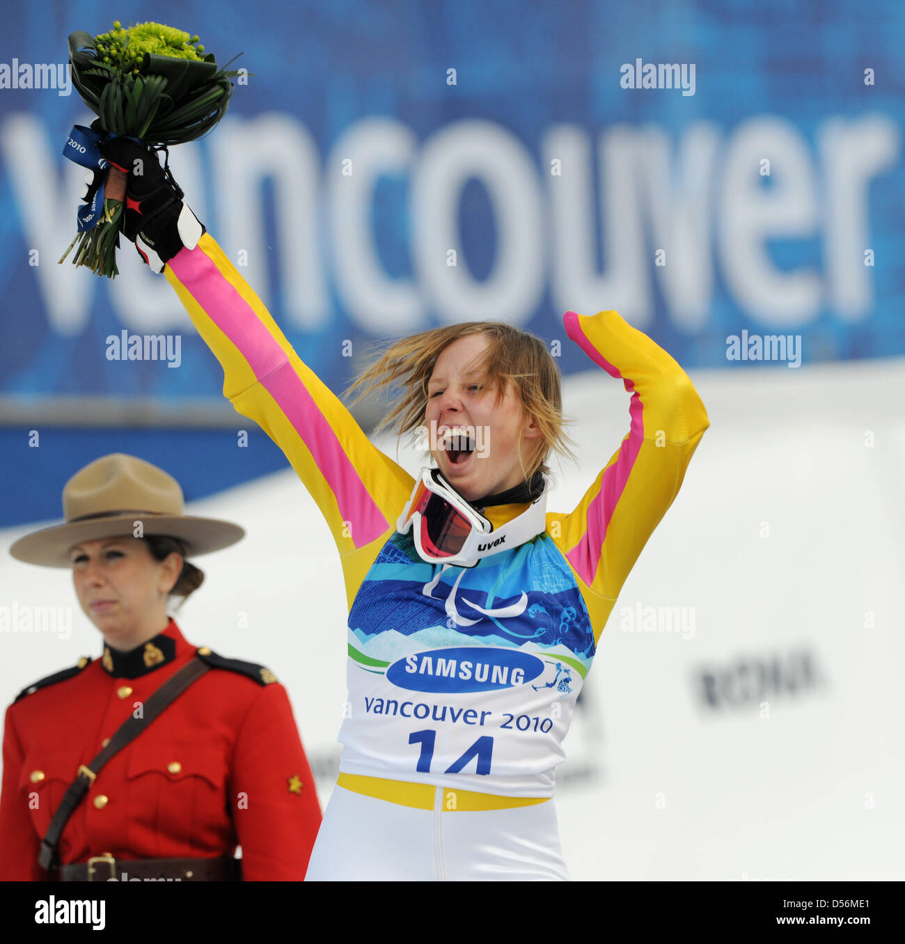 German Andrea Rothfuss celebrates her victory in the standing slalom ...