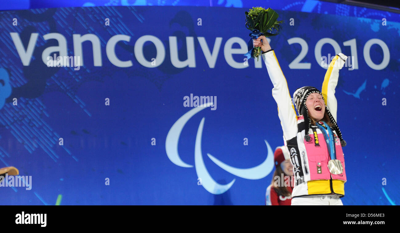 German Andrea Rothfuss celebrates her silber medal in the standing ...