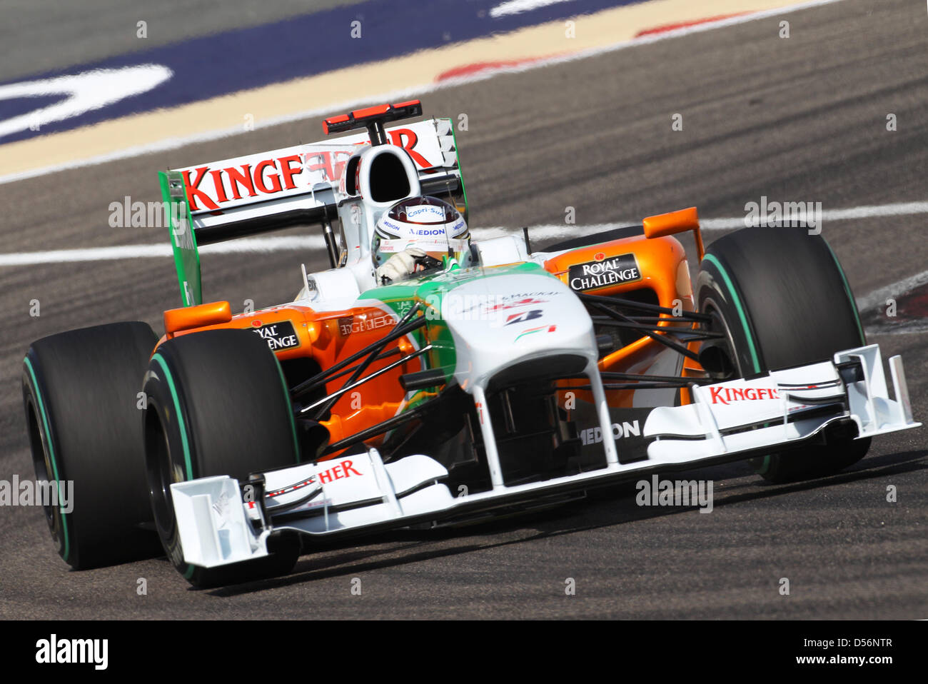 German Formula One driver Adrian Sutil of Force India steers his car ...