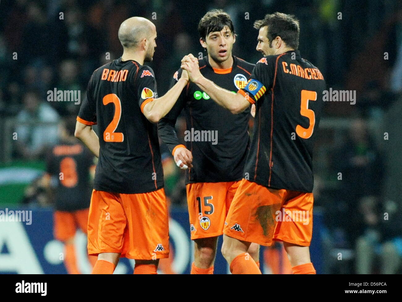 Valencia's Bruno Saltor (L-R), Angel Dealbert and Carlos Marchena ...