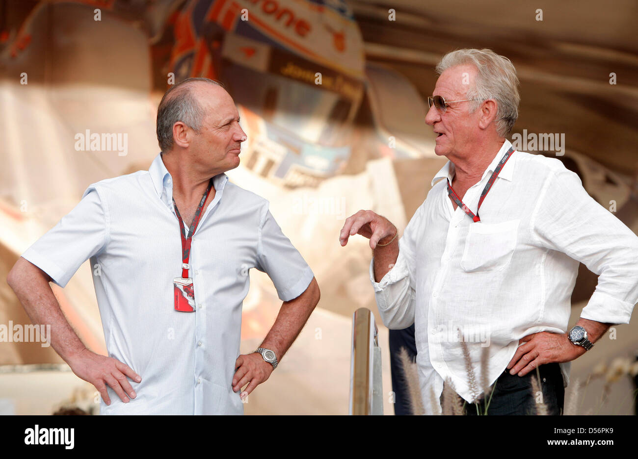 Former McLaren principal Ron Dennis (L) and John Button (R), father of ...