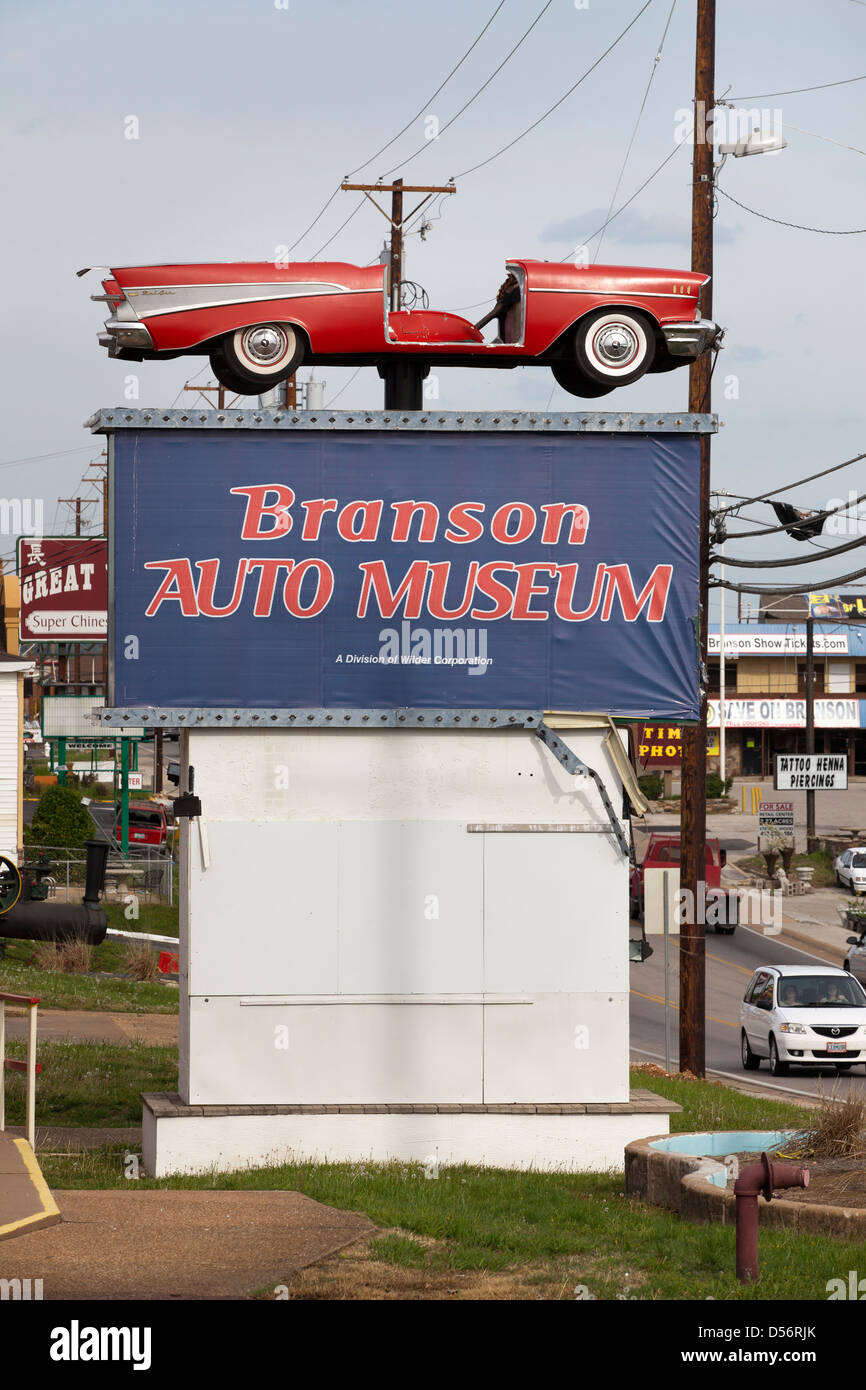 A red 57 Chevy on top op of sign at Branson Auto Museum, Missouri Stock ...