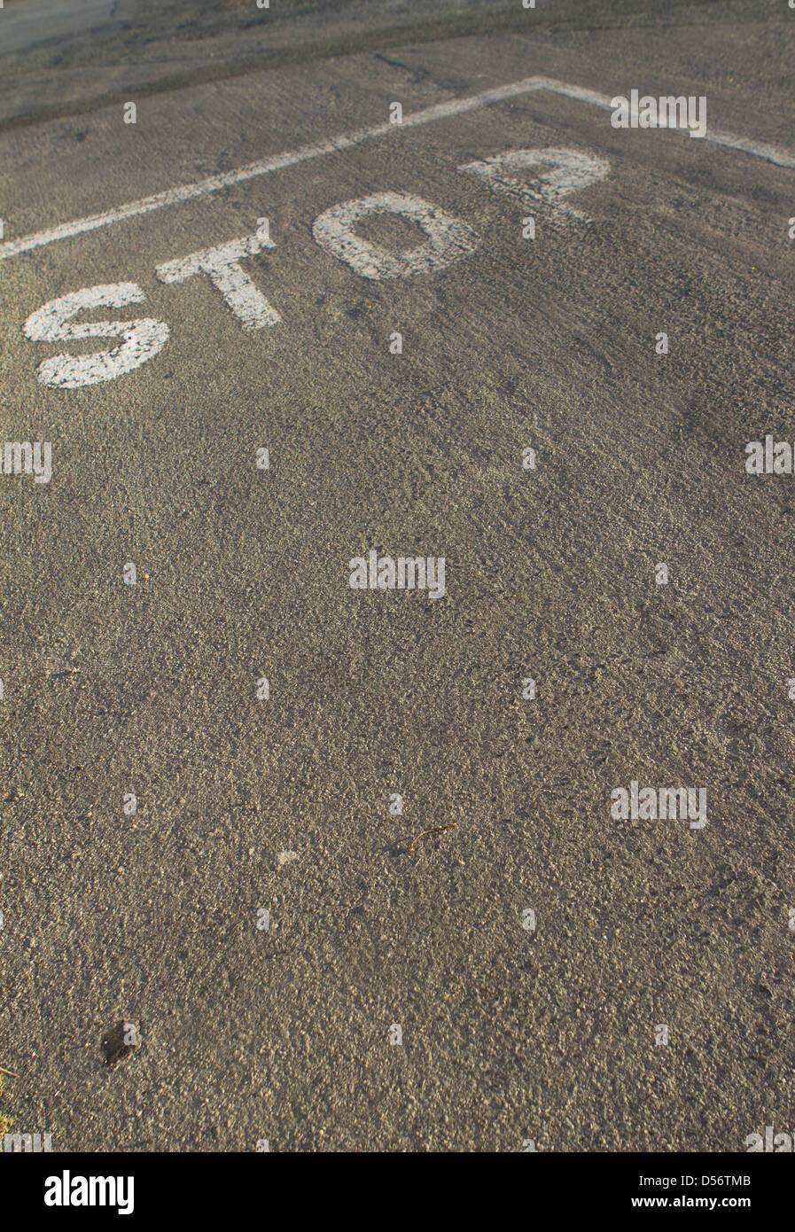 Stop marking on a road Stock Photo - Alamy