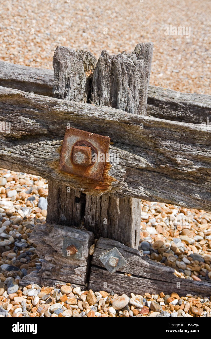 Worn wood groynes on shingle beach, Pevensey Stock Photo - Alamy