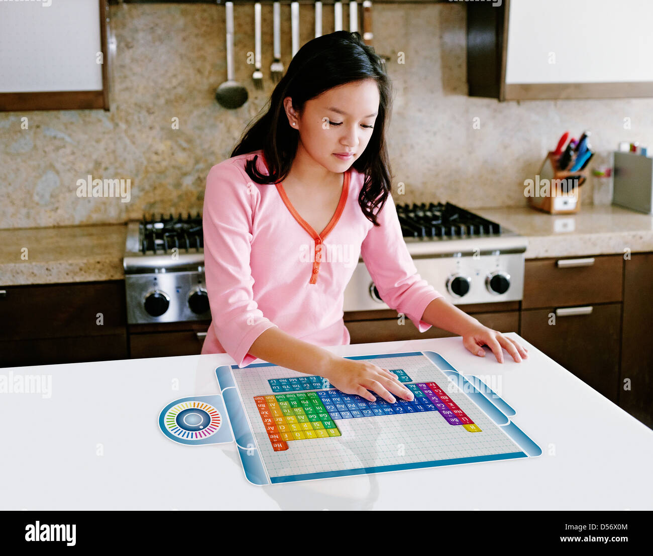 Asian girl using computer in table Stock Photo - Alamy