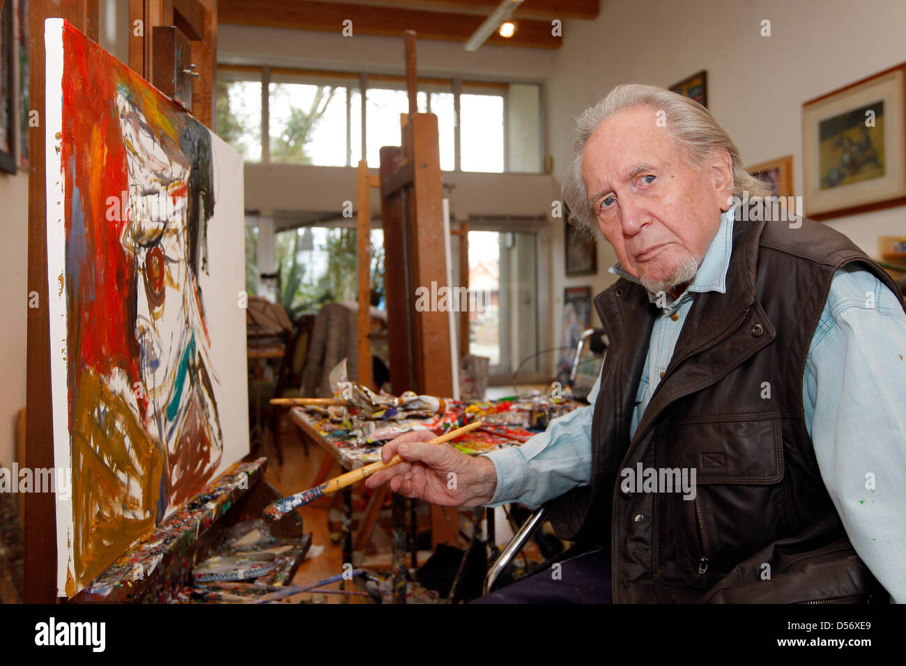 German painter Bernhard Heisig poses for a photo in his studio in ...