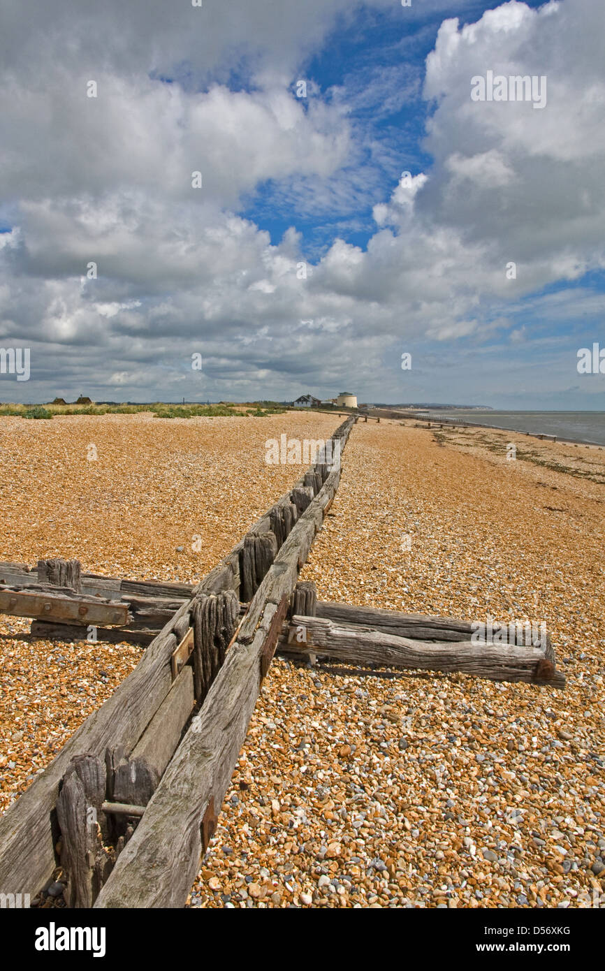 Worn wood groynes on shingle beach, Pevensey Stock Photo - Alamy