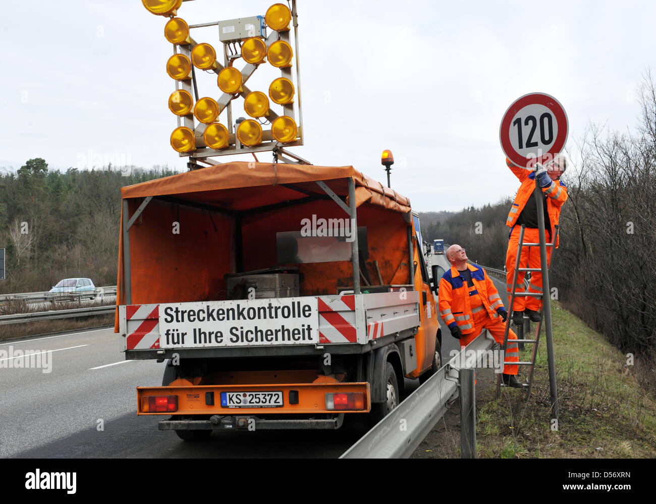 Uwe Reinmoeller of road maintenance authority Kirchheim unmounts a ...