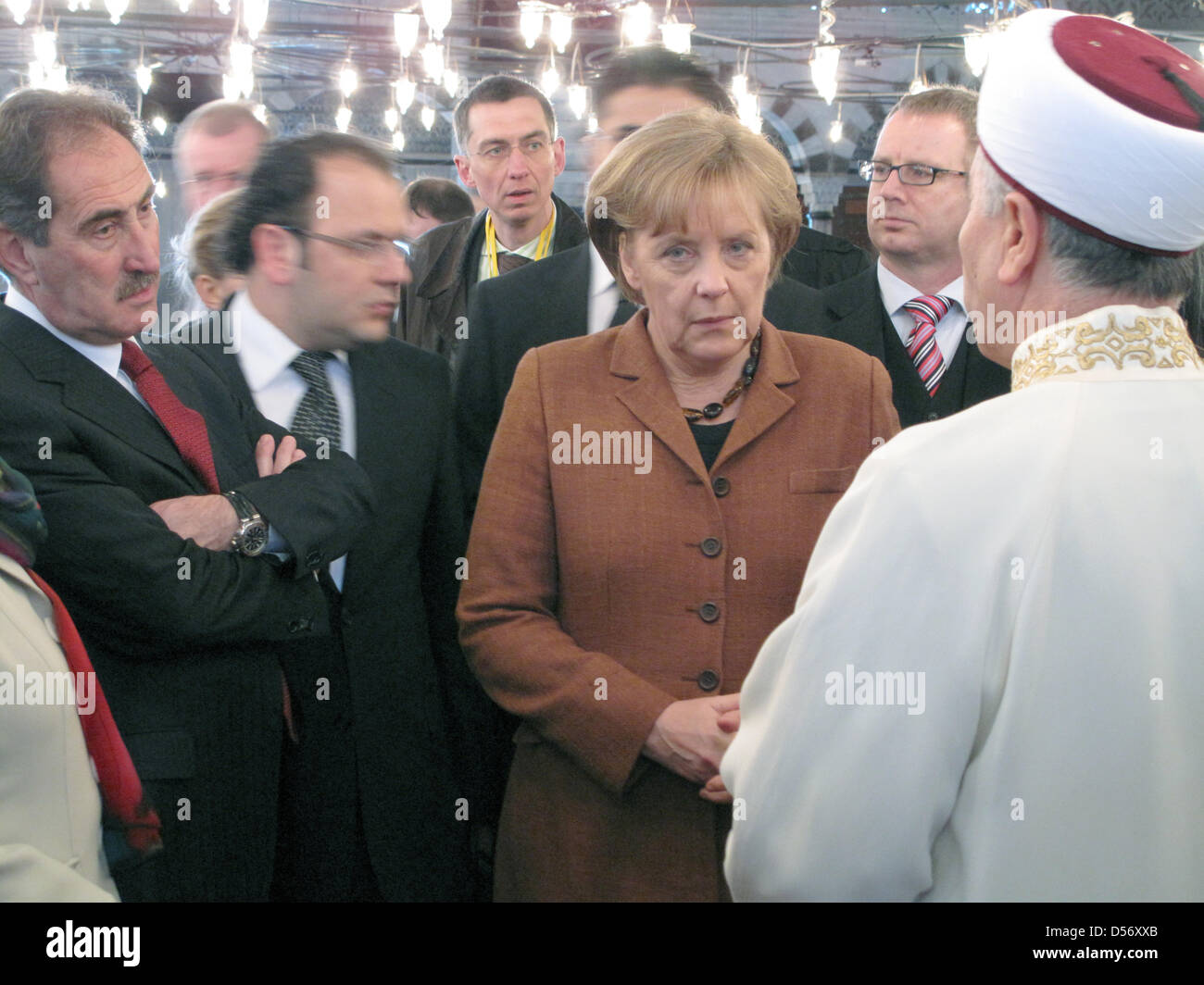 German Chancellor Angela Merkel (C) visits Sultan Ahmed Mosque in ...