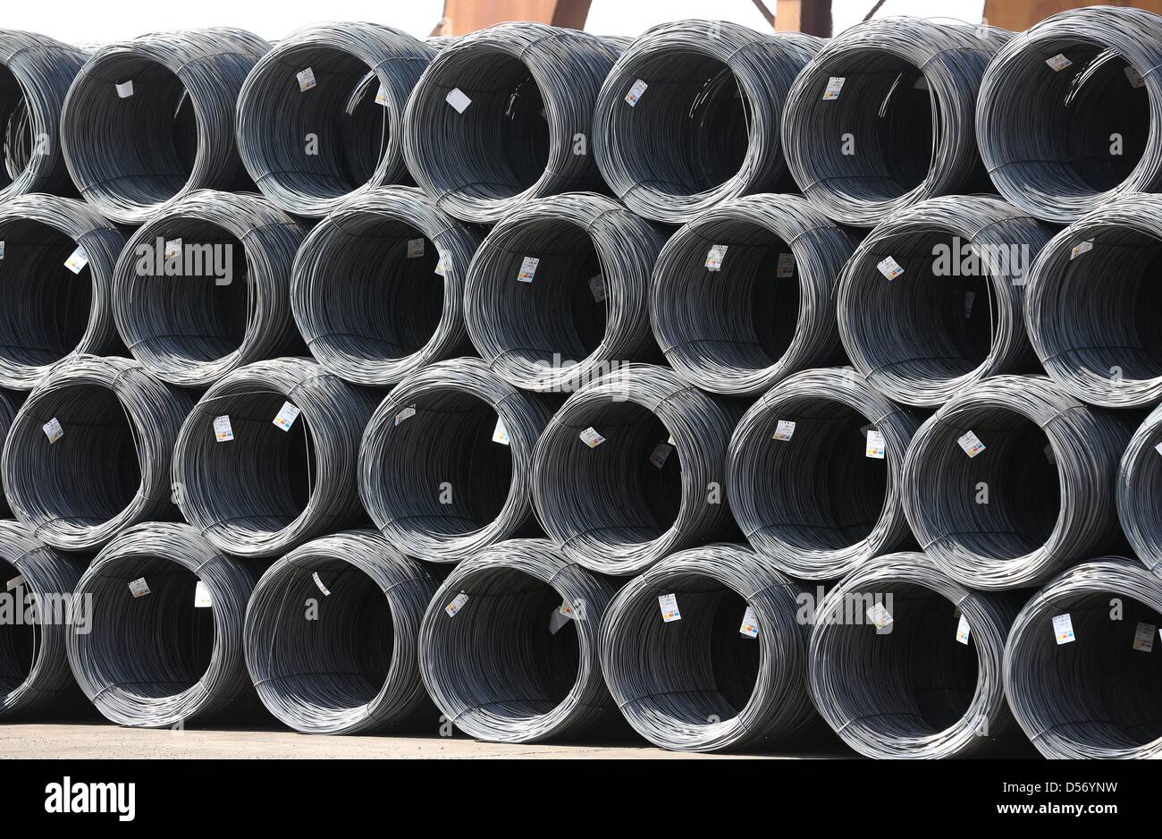 Steel coils are stored at the outdoor premises of the ArcelorMittal ...