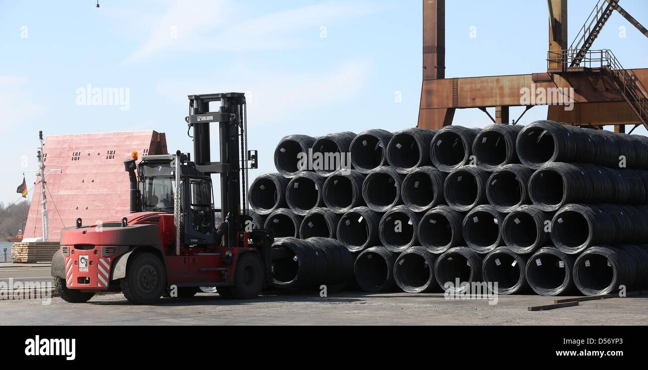 Steel coils are stored at the outdoor premises of the ArcelorMittal ...