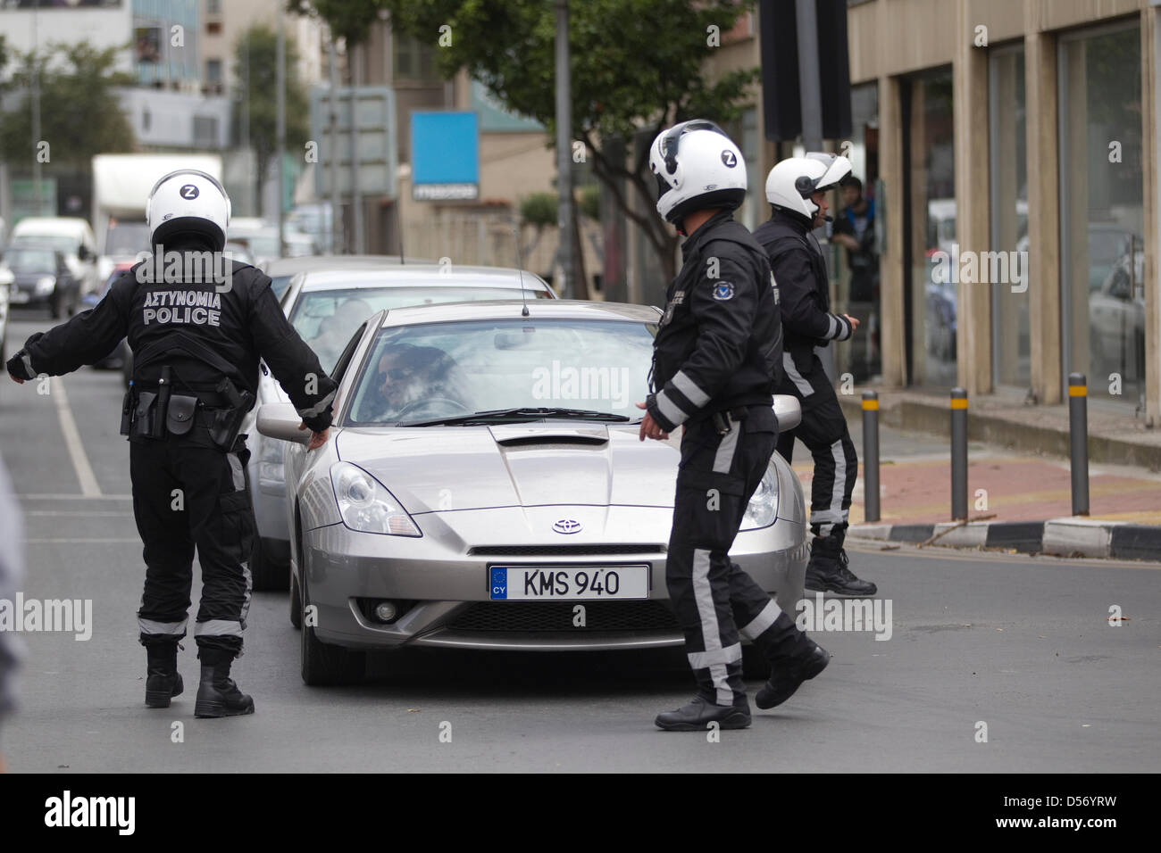 Nicosia, Cyprus. 26th March 2013. Picture shows Police directing ...